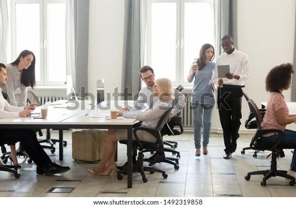 Diverse Employees Using Computers Working Together Stock Photo ...