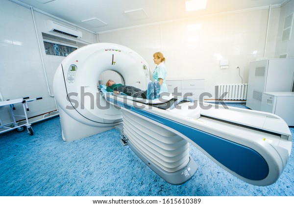 Doctor Analyzes Patient On Ct Scan Stock Photo (Edit Now) 1615610389 Doctor Analyzes Patient On Ct Scan Stock Photo (Edit Now) 1615610389