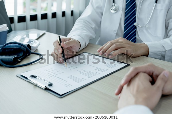 Doctor Hand Write Report Explained Examination Stock Photo 2006100011 ...