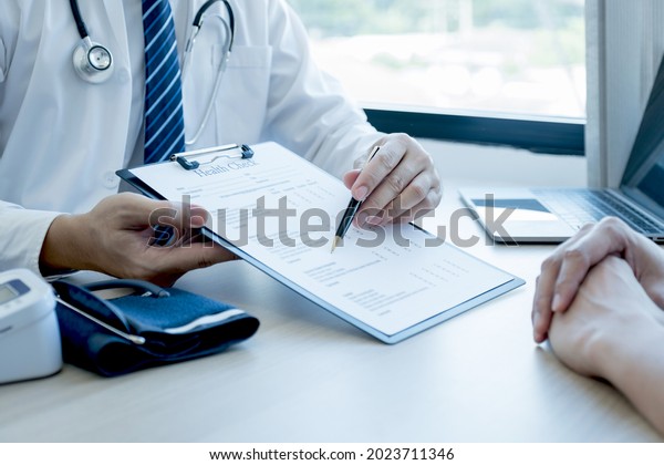 Doctor Hand Write Report Explained Examination Stock Photo 2023711346 ...