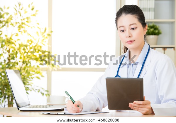 Doctor Using Digital Tablet Check Patients Stock Photo 468820088 ...