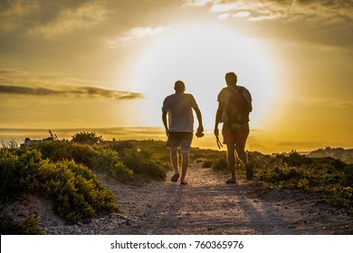 Two friends walking silhouette Stock Photos, Images & Photography ...