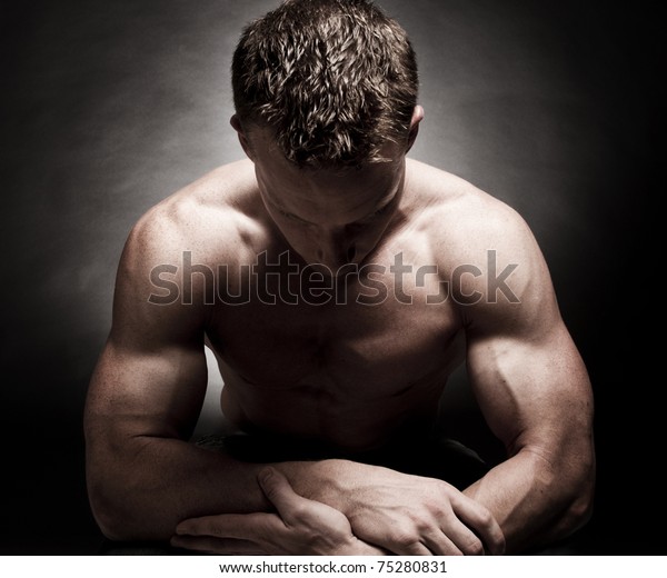 Dramatic Male Bodybuilder Pose Stock Photo (Edit Now) 75280831