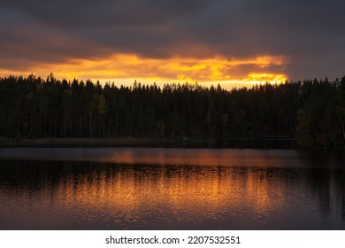 Dramatic Sunset Reflections On Forest Lake Stock Photo 2207532551 ...