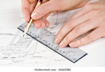 Finger Pointing On Blueprints Stock Photo (Edit Now) 106109765