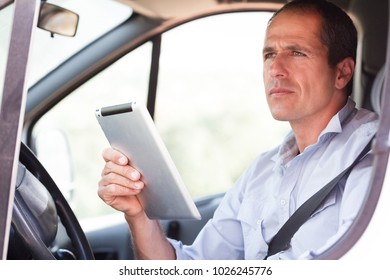 Стоковая фотография 307479197: Bus Driver Making Announcement Using ...