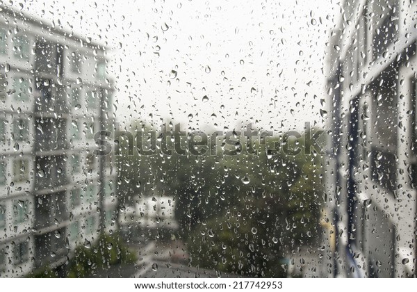 Drops Rain On Window Pane Buildings Stock Photo (Edit Now) 217742953