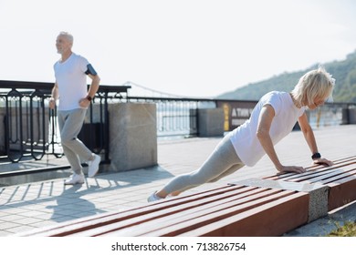 Elderly Lady Doing Pushups While Her Stock Photo 713826754 | Shutterstock