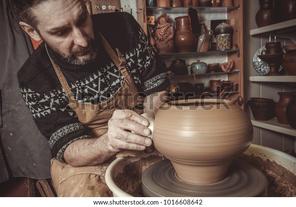 Elderly Man Making Pot Using Pottery Stock Photo (Edit Now) 1016608642