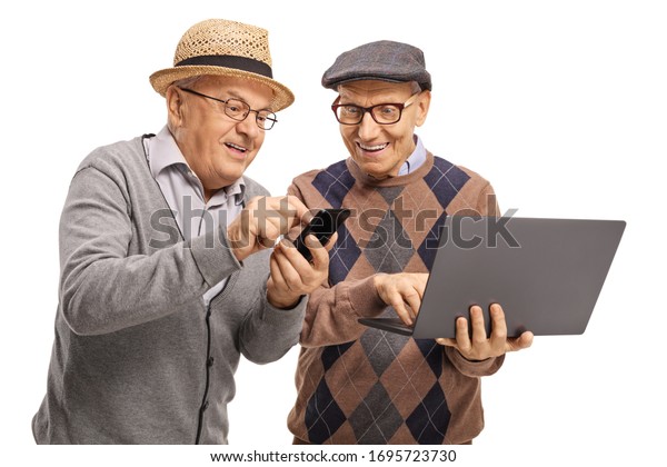 Ancianos que usan un ordenador portátil Foto de stock 1695723730 ...