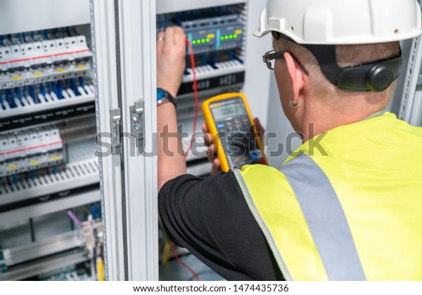 Electrical Engineer Performs Measurement Control Cabinet Stock Photo ...