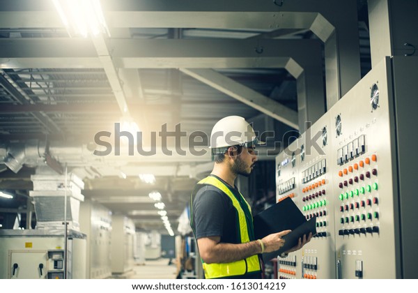 Electrical Engineer Team Working Front Control Stock Photo 1613014219 ...