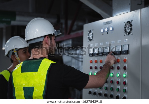 Electrical Engineer Team Working Front Hvac Stock Photo 1627843918 ...