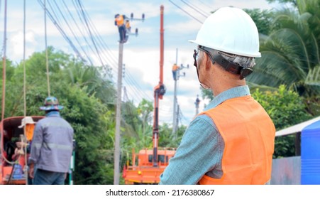 Electrical Engineer Watching Work Workers Stock Photo 2176380867 ...