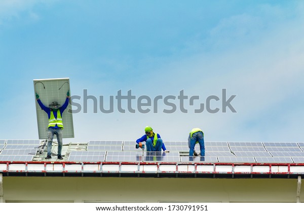 Electrical Engineering Technician Workers Team Installing Stock Photo ...