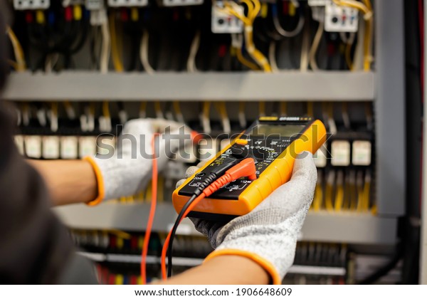 Electrician Engineer Uses Multimeter Test Electrical Stock Photo (Edit ...