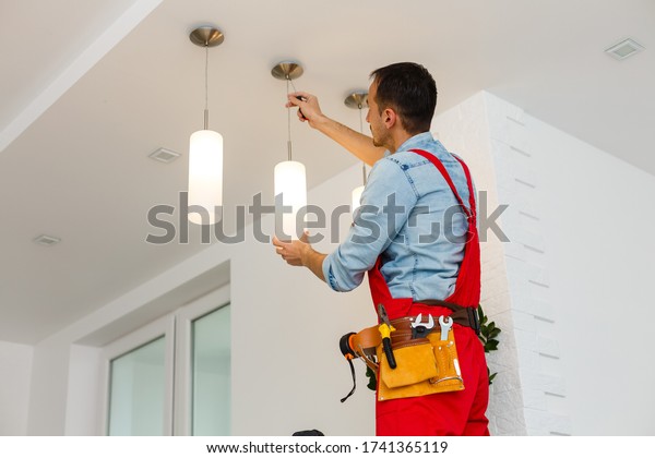 Electrician Man Worker Installing Ceiling Lamp Stock Photo (Edit Now ...