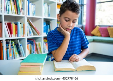 Elementary Boy Reading Book Table School Stock Photo 452778466 ...