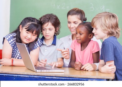 Teacher Watching Over Young Boy Girl Stock Photo 310989794 | Shutterstock