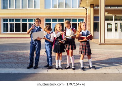 Cute Young Primary School Students Standing Stock Photo (Edit Now ...