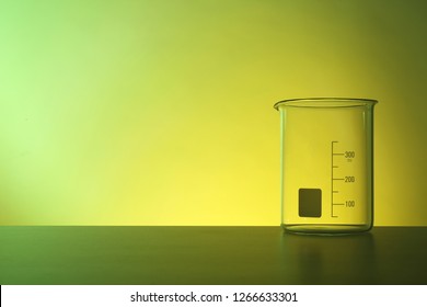 Empty Beaker On Table Against Color Stock Photo 1268030845 | Shutterstock