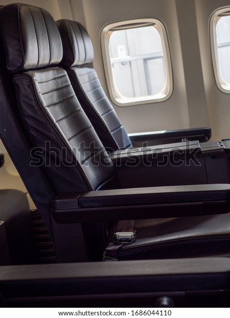 Empty First Class Window Aisle Seat Stock Photo 1686044110 | Shutterstock
