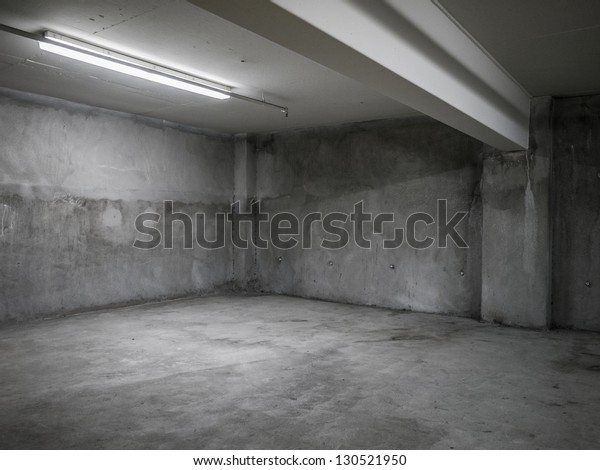 Empty industrial garage room interior with concrete floor and wall ...