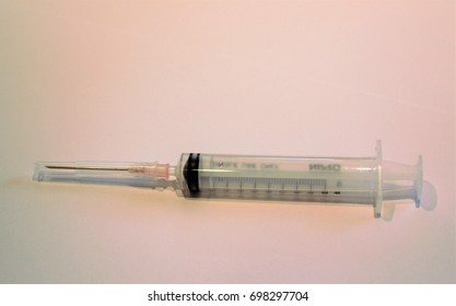 Empty Plastic Syringe Tiny Needle On Stock Photo 698297704 | Shutterstock