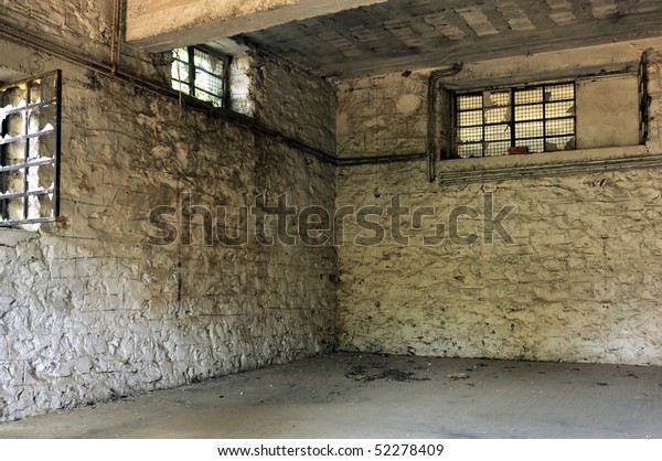 Empty room broken windows and textured white wall. Abandoned factory ...