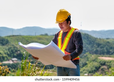 Engineer Hold Construction Paper Plan Look Stock Photo (Edit Now ...