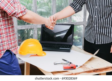Engineer Shaking Hands Concept Stock Photo 693028369 | Shutterstock