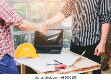 Engineer Shaking Hands Concept Stock Photo (Edit Now) 695636170