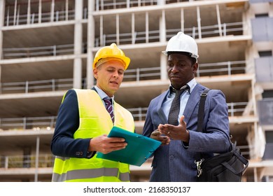 Engineer Standing Builder Supervising Construction Process Stock Photo ...
