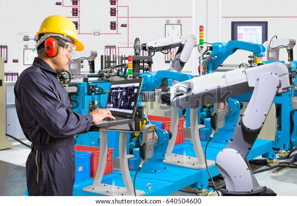 Engineer Using Laptop Computer Maintenance Automatic Stock Photo ...