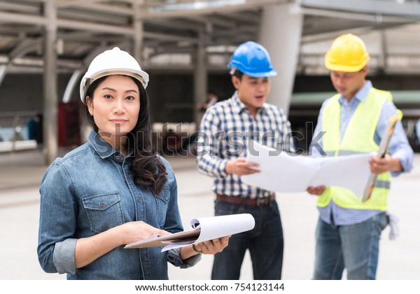 engineering construction concept : professional engineer team meeting ...