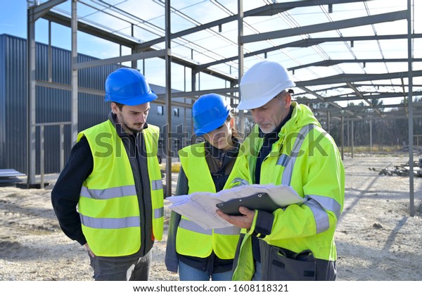 Engineering Instructor Working On Building Site Stock Photo 1608118321 ...