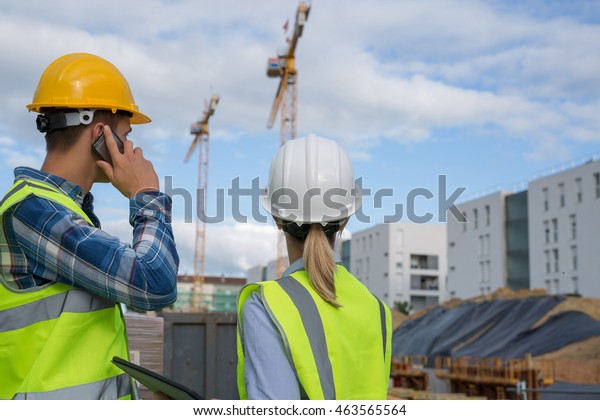 Engineers Using Mobile Phone Construction Site Stock Photo (Edit Now ...
