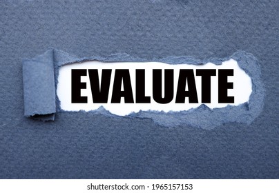 Evaluation Text Inside Torn Blue Paper Stock Photo 1965157153 ...