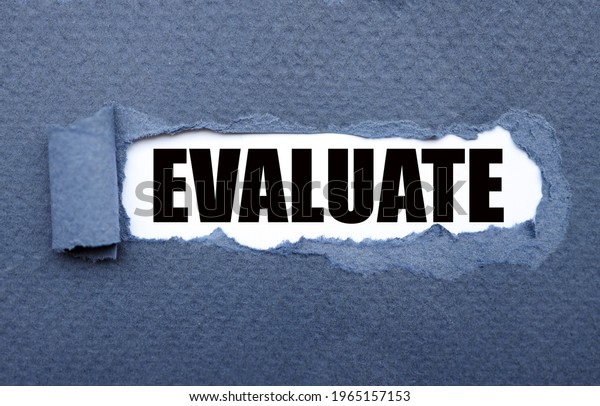 Evaluation Text Inside Torn Blue Paper Stock Photo 1965157153 ...