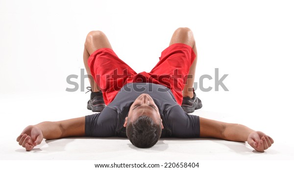 Exhausted Athletic Man Lying Down On Stock Photo (Edit Now) 220658404