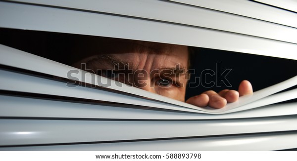 Face Behind Blinds Stock Photo (Edit Now) 588893798