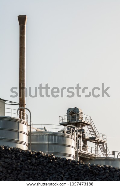 Factory complex quicklime production. Silos, chimney lump lime crasher ...