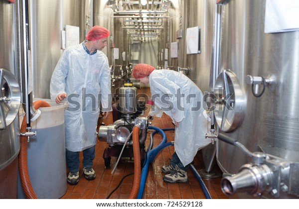 Factory Worker Cleaning Floor Stock Photo (Edit Now) 724529128