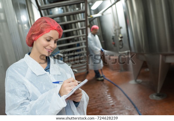 Factory Worker Cleaning Floor Stock Photo (Edit Now) 724628239