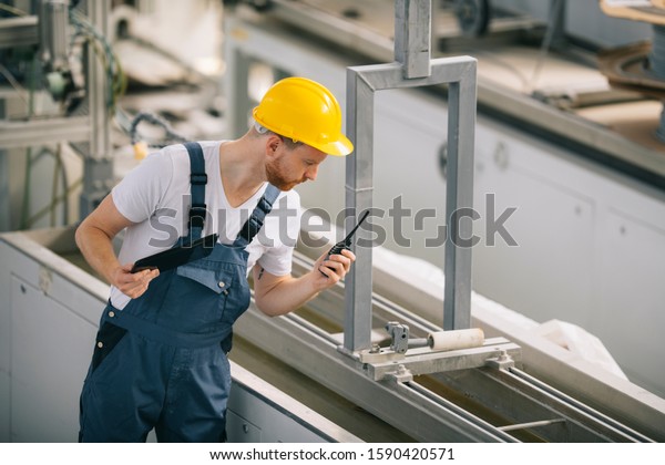 Factory Worker Man Doing Inspection On写真素材1590420571 | Shutterstock