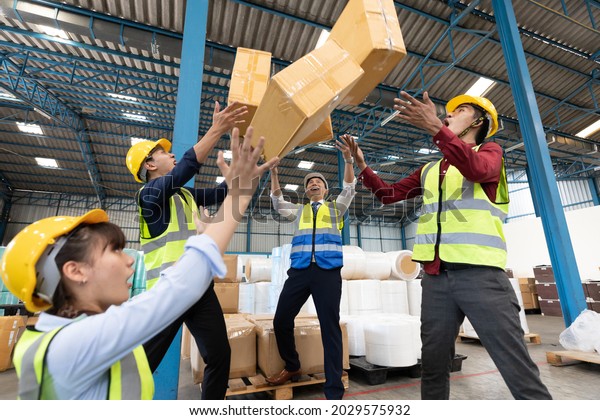Factory Workers Throwing Boxes Success Project Stock Photo 2029575932 ...