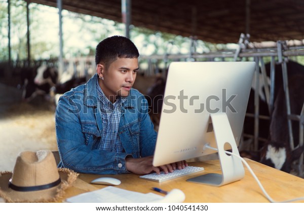 Farmer Using Computer Farm Information Sell Stock Photo 1040541430 ...