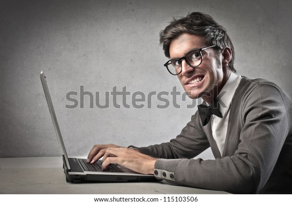 Fashionable Forcibly Smiling While Using Laptop Stock Photo 115103506 ...