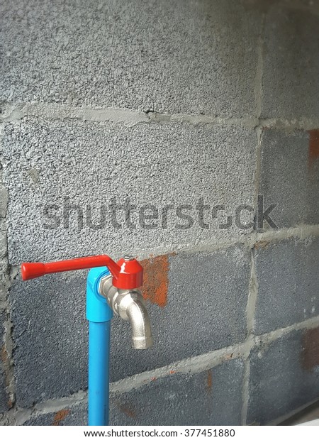 Faucet Water Path On Brick Wall Stock Photo 377451880 | Shutterstock
