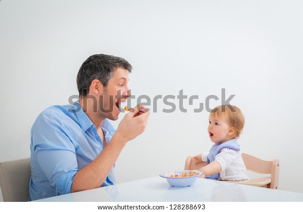 Feed Kid Stock Photo (Edit Now) 128288693
